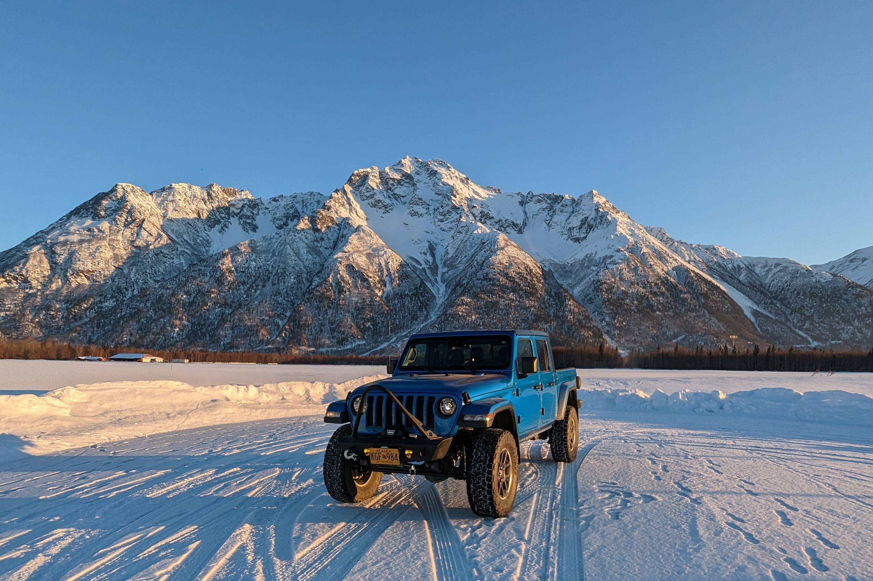 Alaska Daily Drivers: Hydro Blue 80A and Bright White JTR | Jeep ...